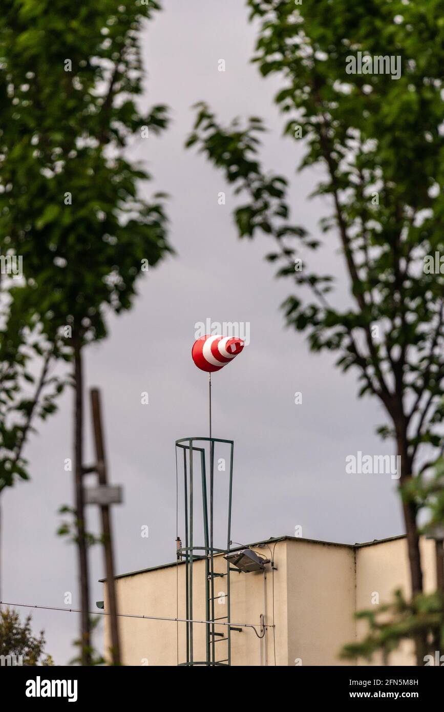 Wind indicator on the roof. Tight weather vane during high winds. Roof ...