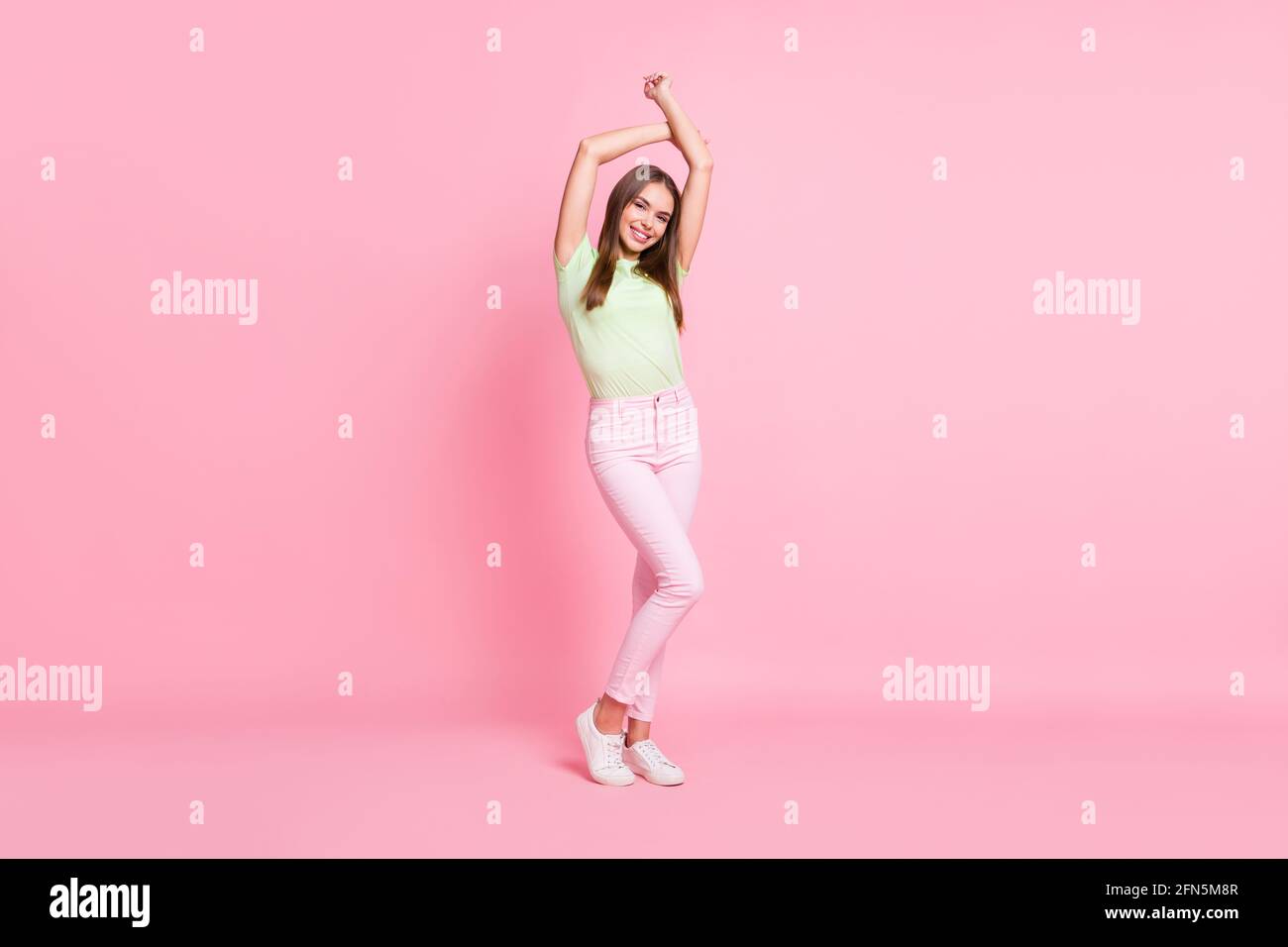 Full length photo of charming cute young girl dressed green t-shirt ...