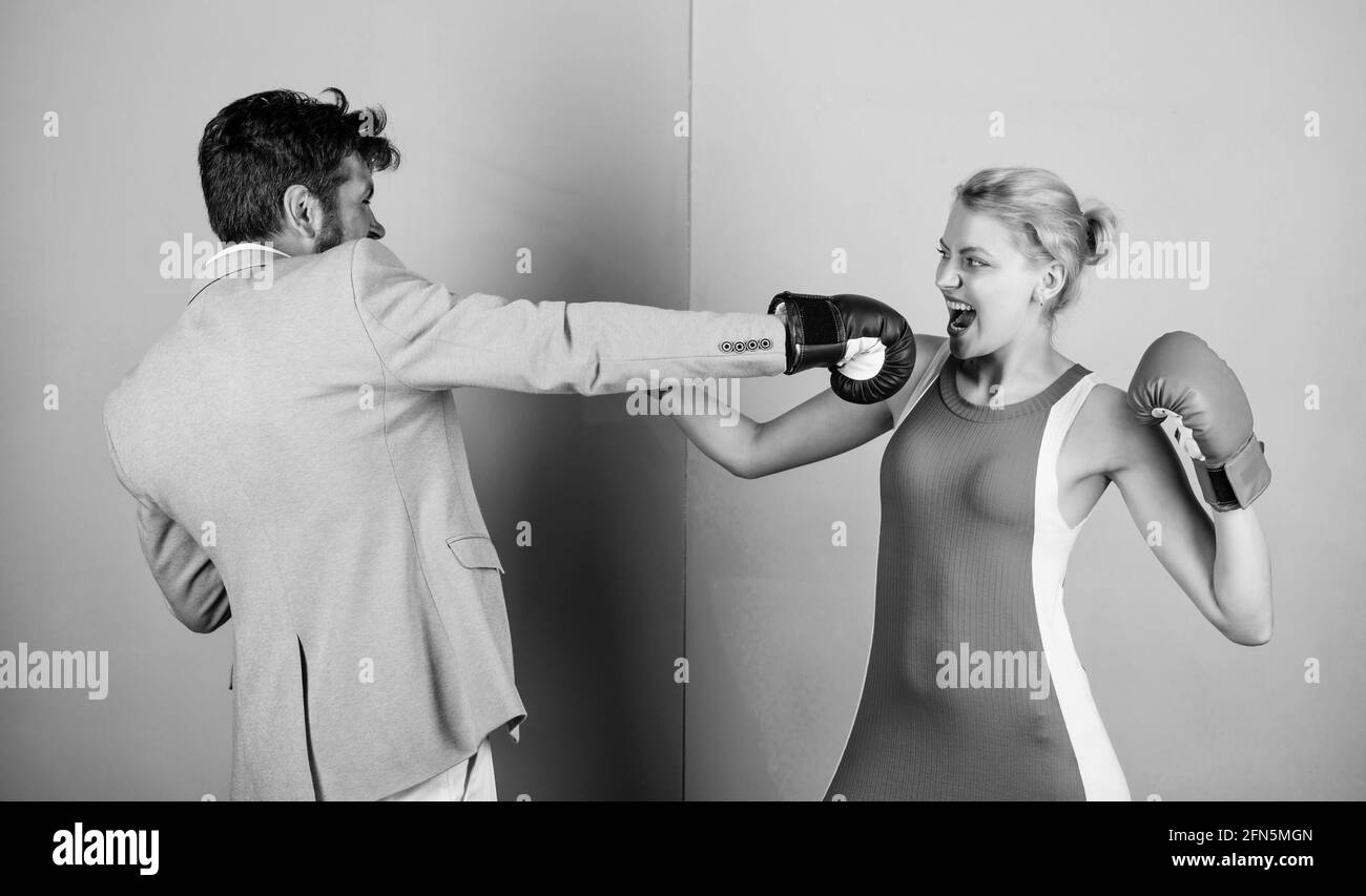 Gender battle. Gender equal rights. Family quarrel. Strong punch ...