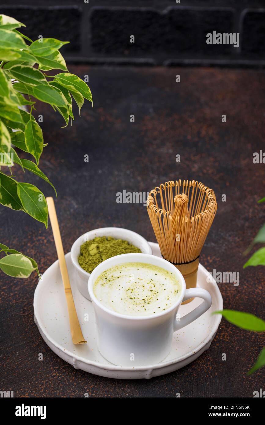Green healthy matcha latte drink Stock Photo - Alamy