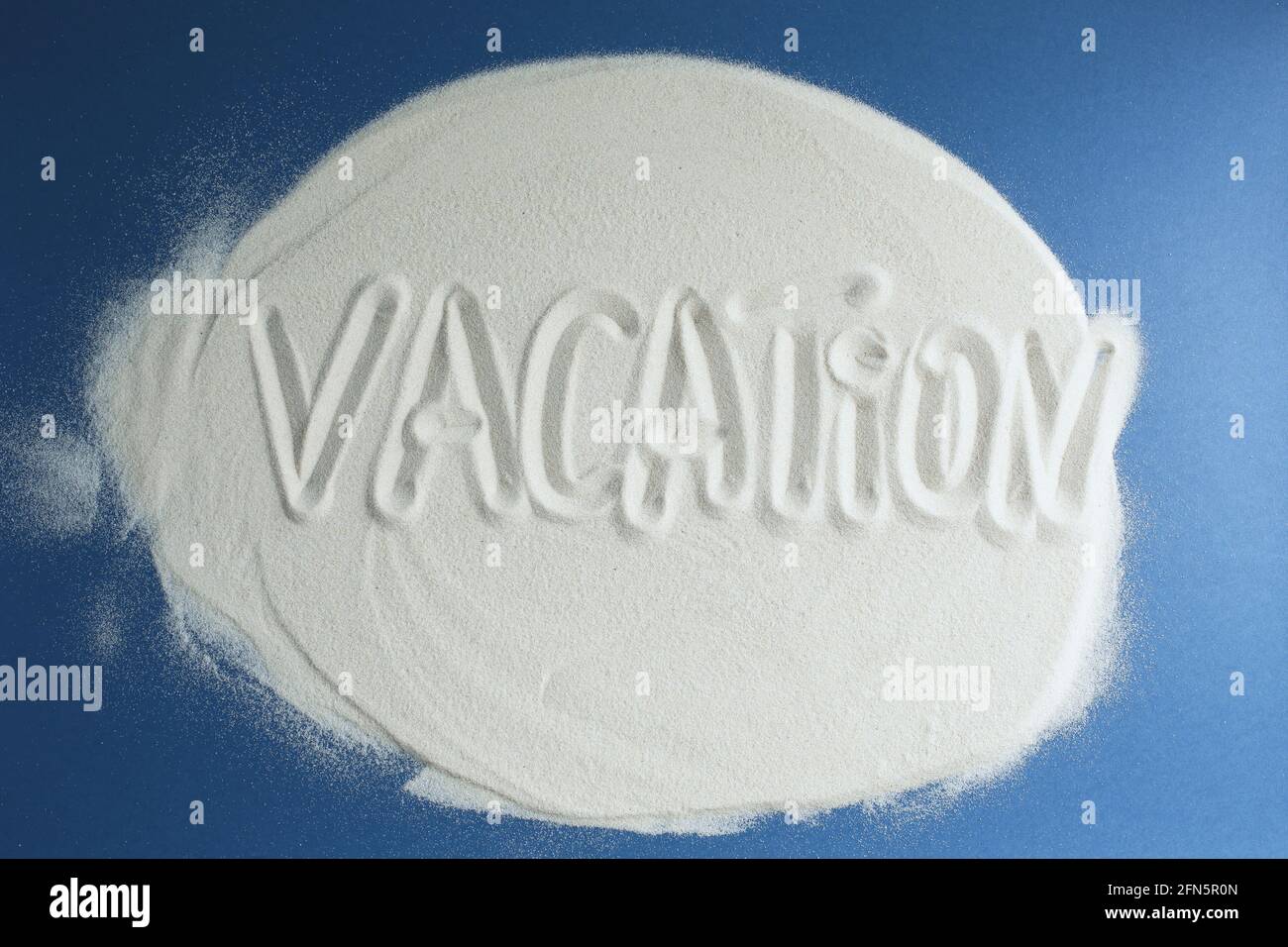 Handwritten vacation Word on the Sand Coast. Vacation on sea idea ...