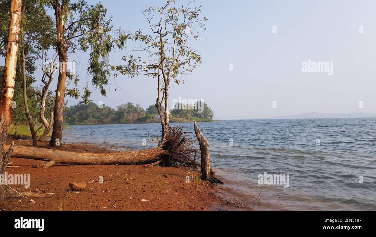 Pavana lake side view on a winter noon. Pavana lake is located in ...
