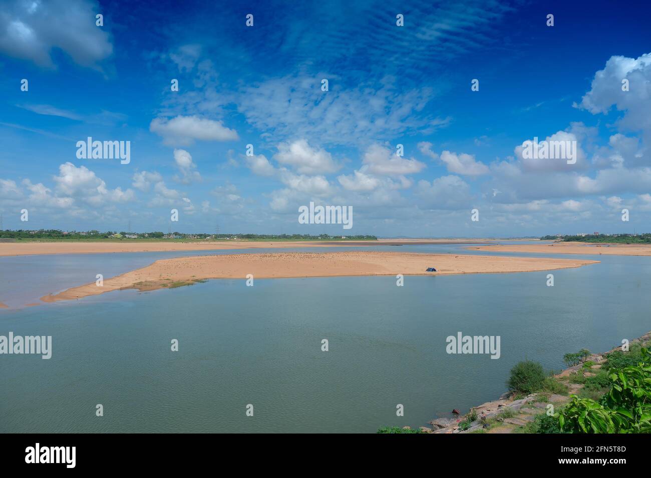 Beautiful landscape image of Mahanadi river of Odisha, with blue sky ...