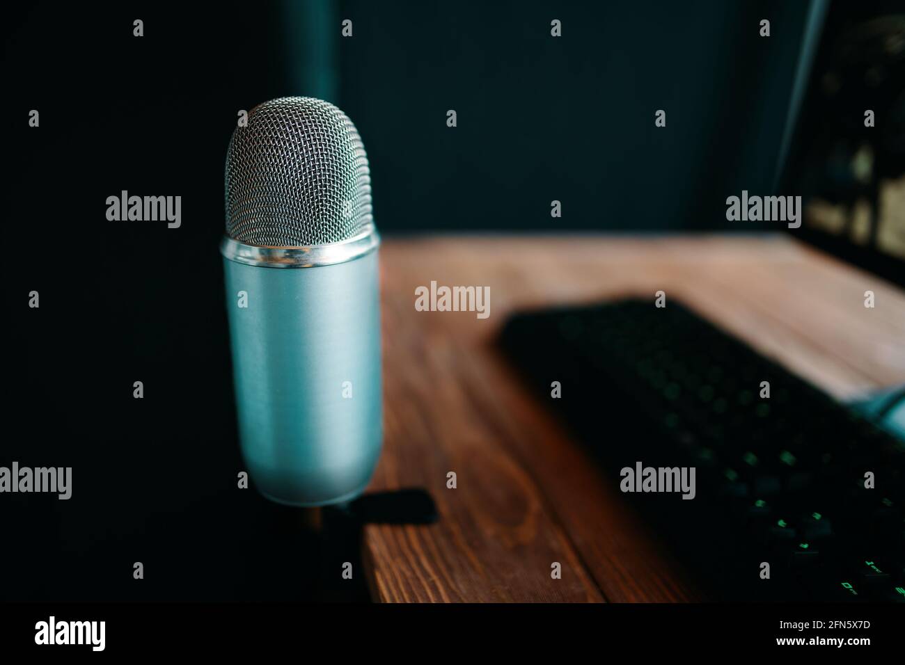 Mic with keyboard in radio or podcast studio. Vintage microphone for ...