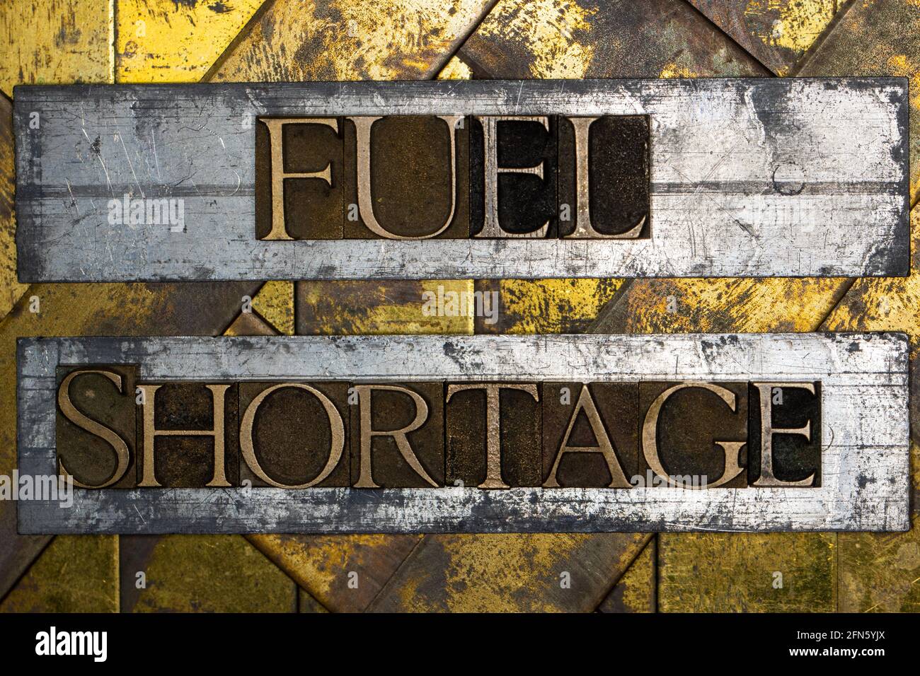 Fuel Shortage text on vintage textured grunge copper and gold steampunk ...