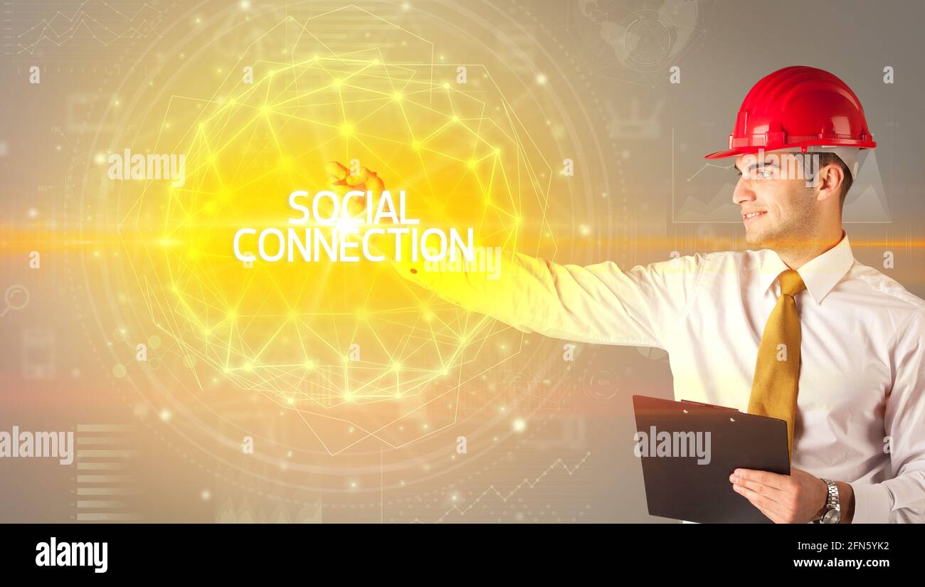 Handsome businessman with helmet drawing Stock Photo - Alamy