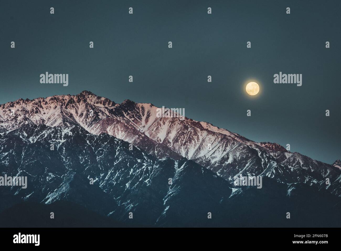 Full moon over mountain village hi-res stock photography and images - Alamy