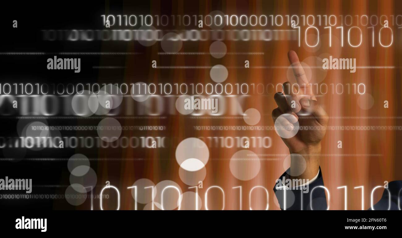 Composition of man touching screen with binary coding and white spots ...