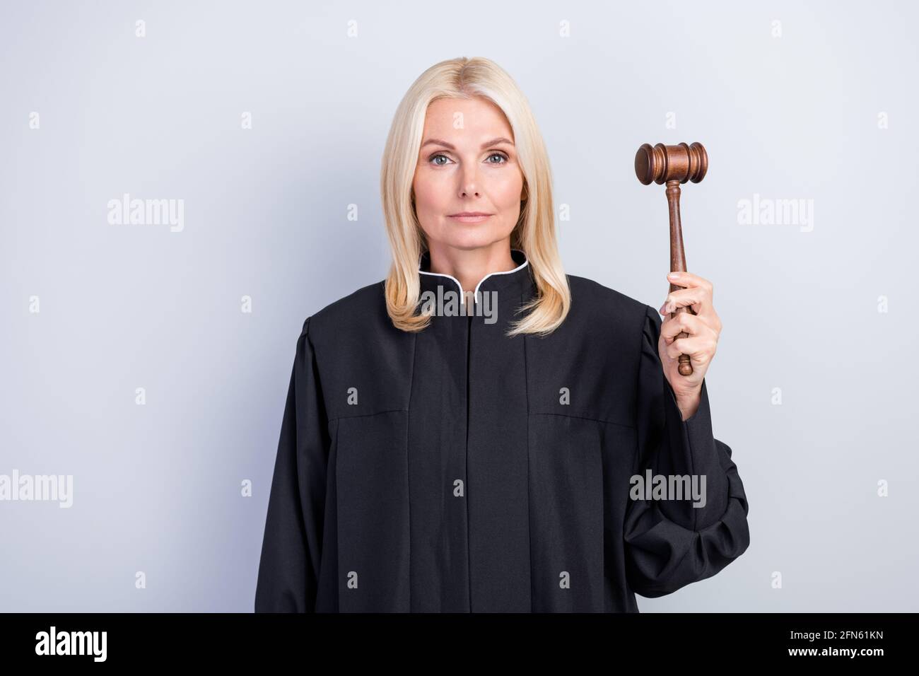 Portrait of attractive trendy experienced middle-aged woman judge ...