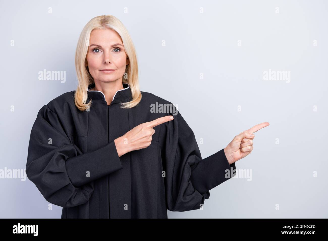 Portrait of attractive serious content skilled woman judge ...