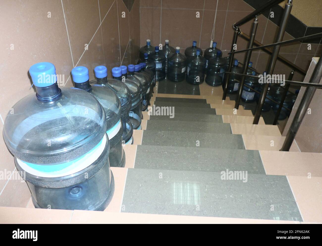 many water bottle on staircase Stock Photo - Alamy