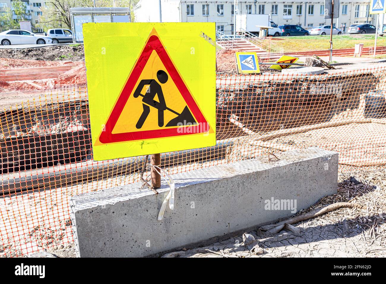 Road works traffic sign at the city street. Road under construction ...
