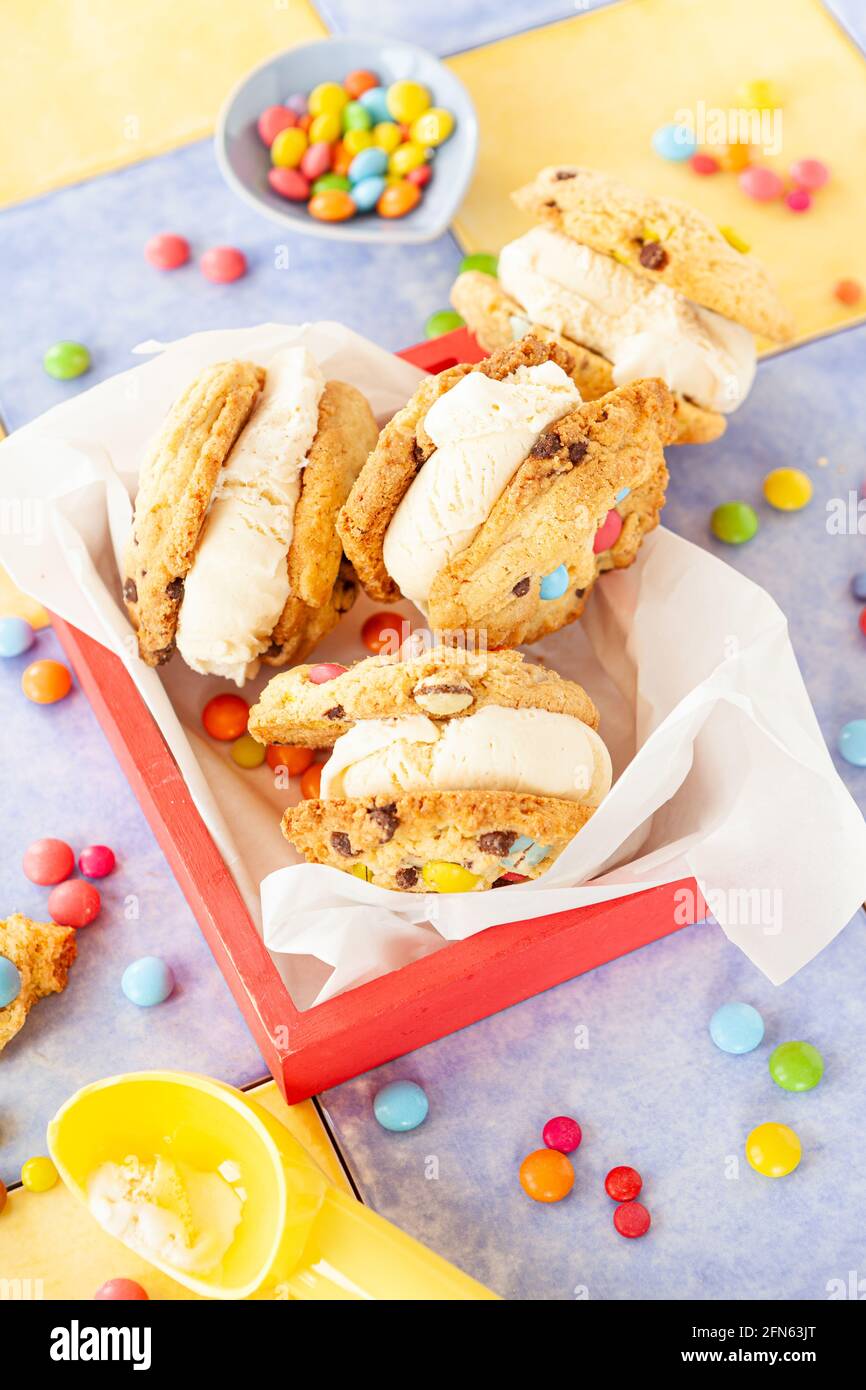 Vanilla ice cream sandwich with chocolate chip cookies and colorful ...