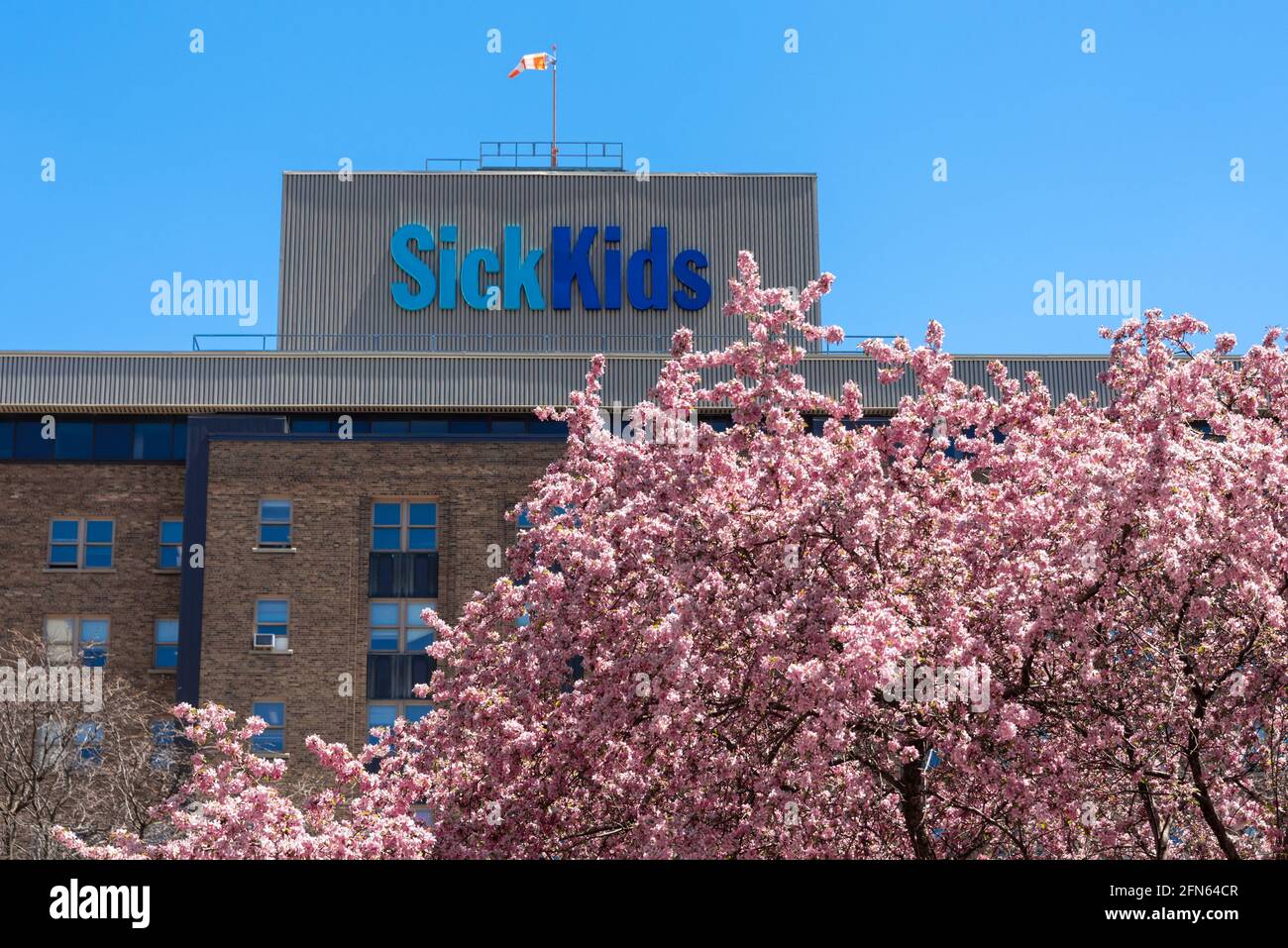 SickKids Hospital Logo on top of building. Springtime season arrival in ...