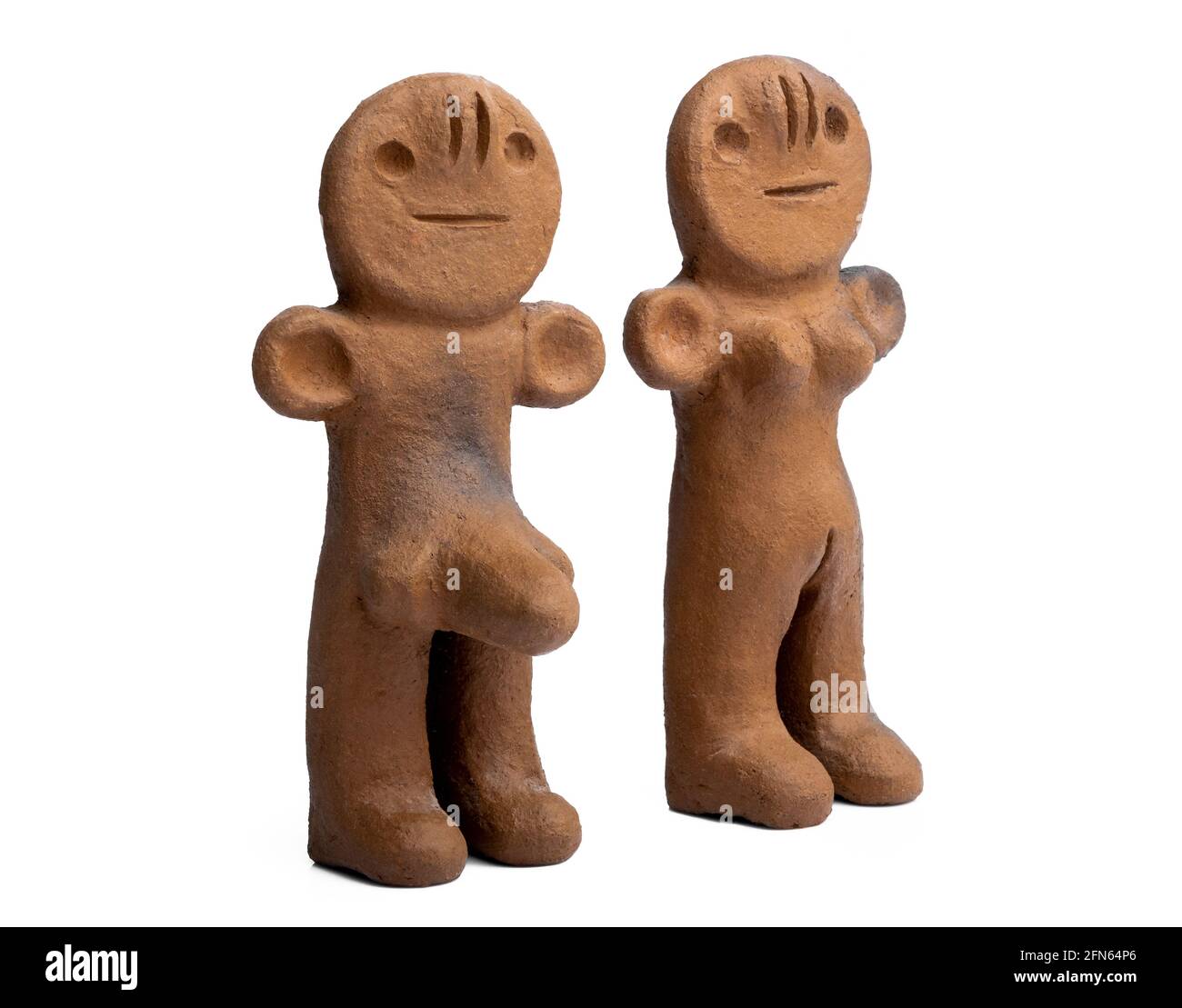 Ancient clay male and female figurines from Canary Islands isolated on ...