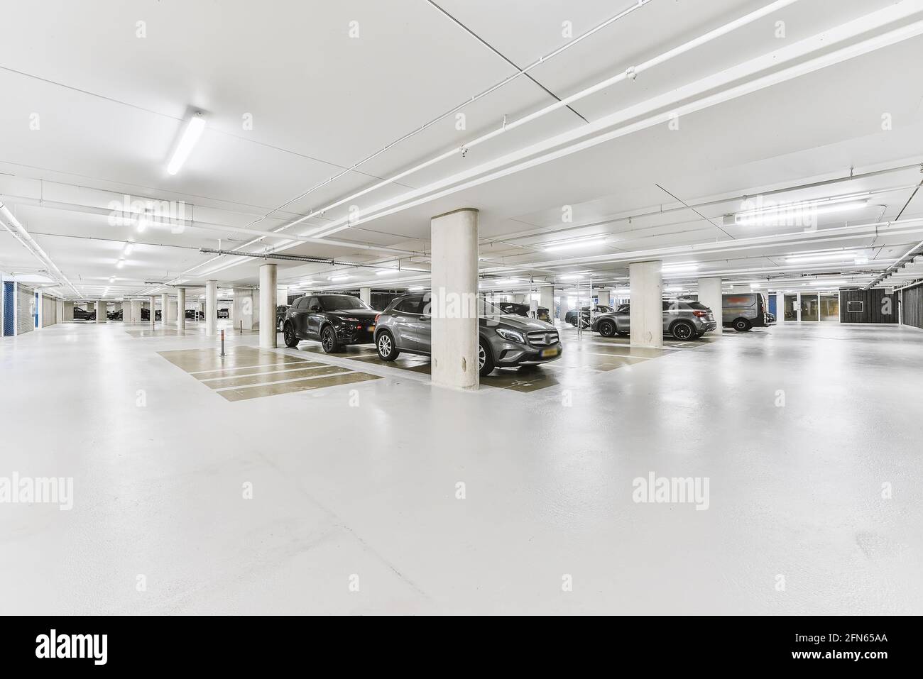 Modern building parking with luxury cars Stock Photo - Alamy Modern building parking with luxury cars Stock Photo - Alamy