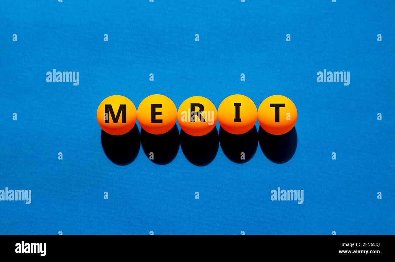 Merit symbol. Orange table tennis balls with the words 'merit ...