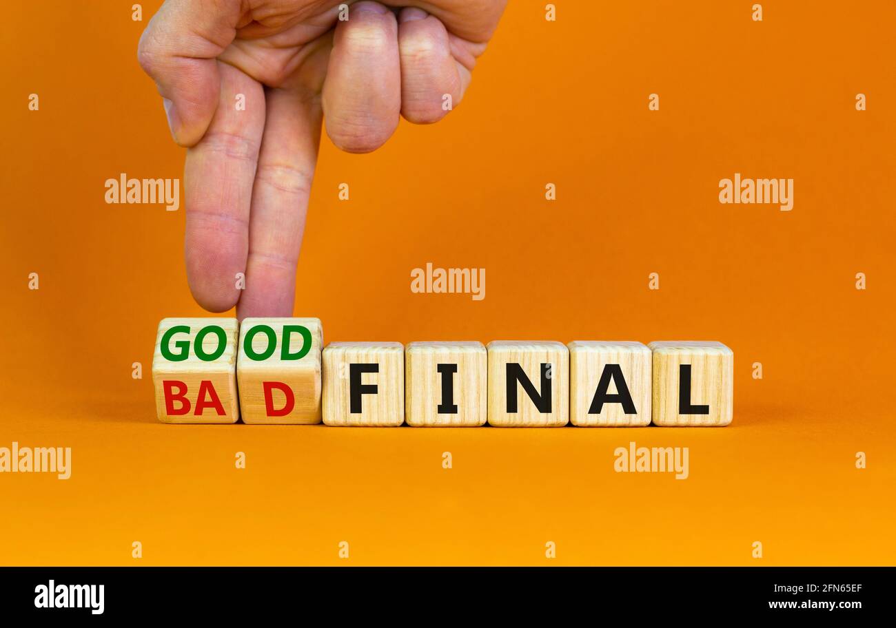 Good or bad final symbol. Businessman turns wooden cubes and changes ...
