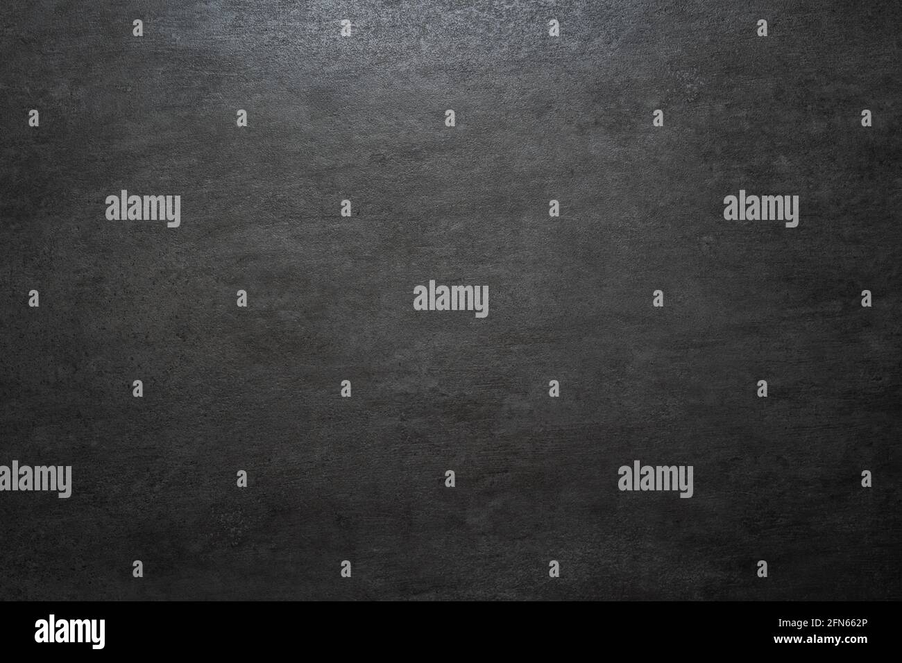 dark gray concrete stone wall with light gradient and copy space Stock ...