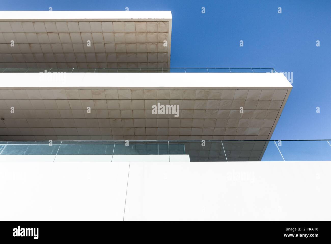 Low angle view of terraces of a modern minimalist white concrete ...