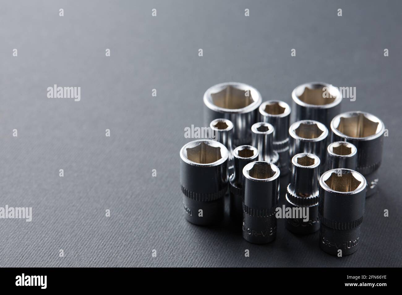 Set of heads for screwdriver. Tools collection. close up, Bits on black ...