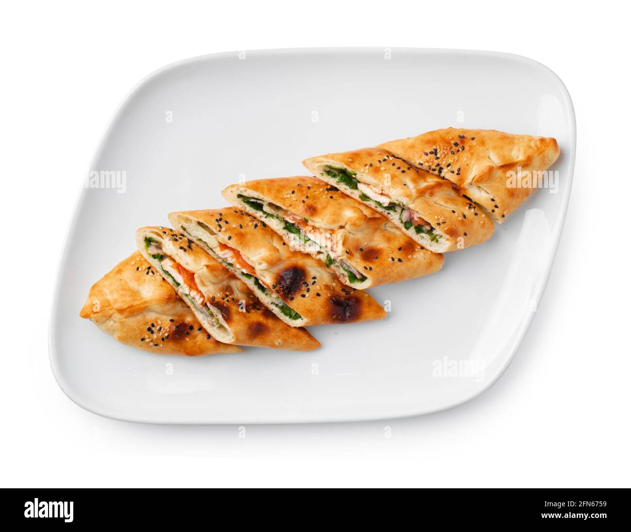 Turkish boat-shaped flatbread pide isolated on white Stock Photo - Alamy