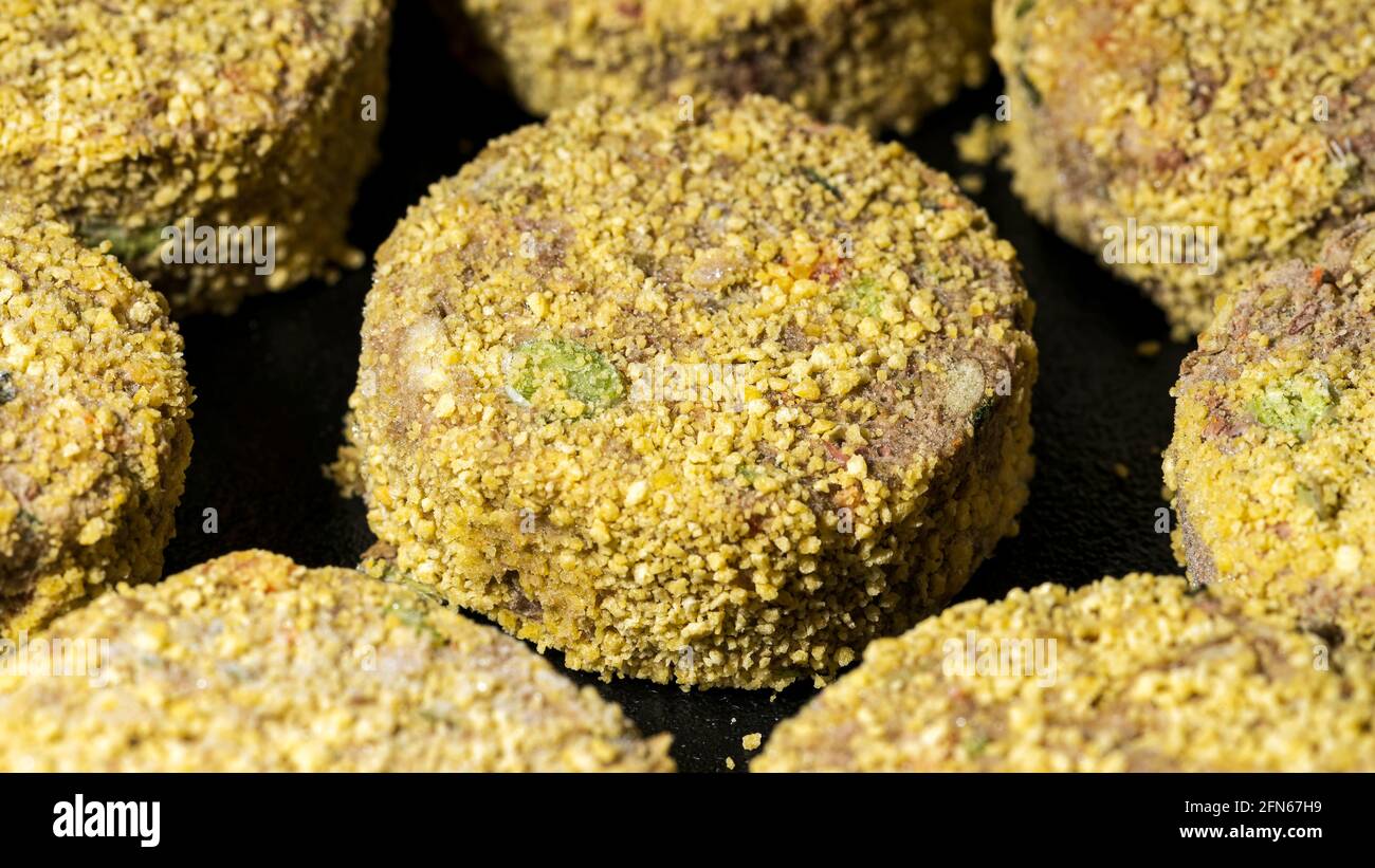 Frozen veggie nuggets with lentils and greens, macro Stock Photo - Alamy