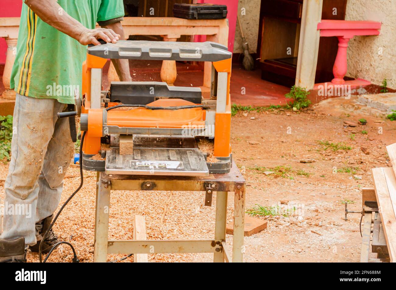 Benchtop Planer Front View And At Work Stock Photo - Alamy