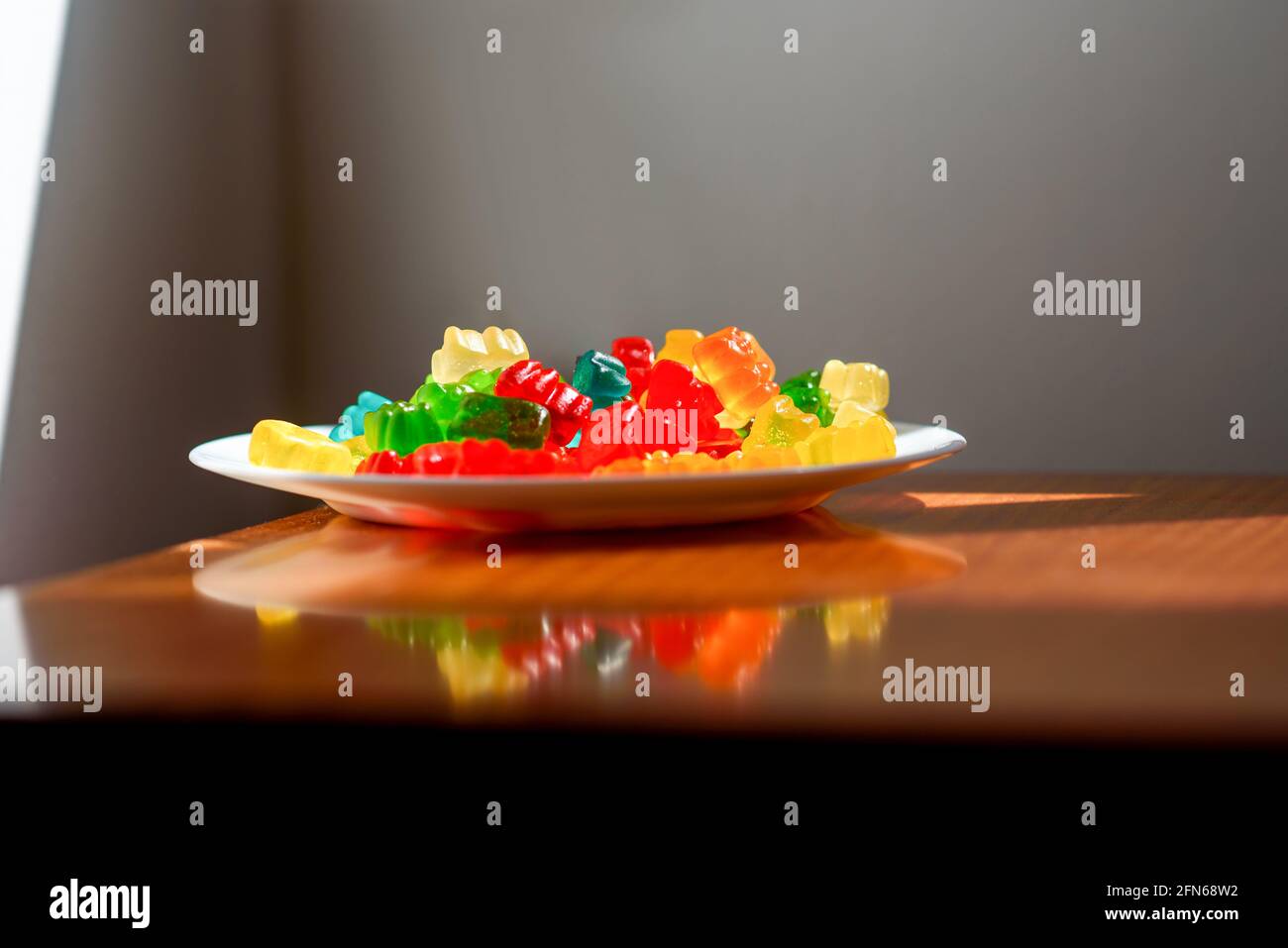Styled Still Life Of Gummy Bears On Table With Bright Directional Light ...