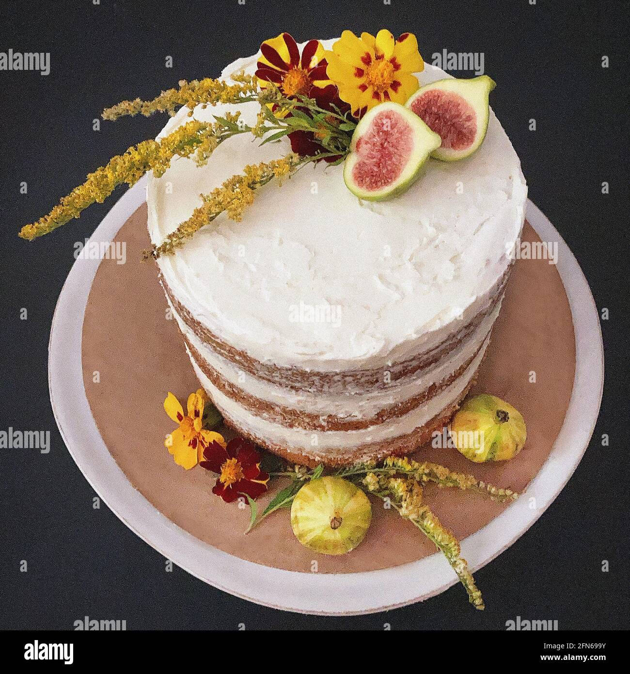 Vanilla Layer Cake Decorated with Edible Fresh Flowers and Fruit Stock ...
