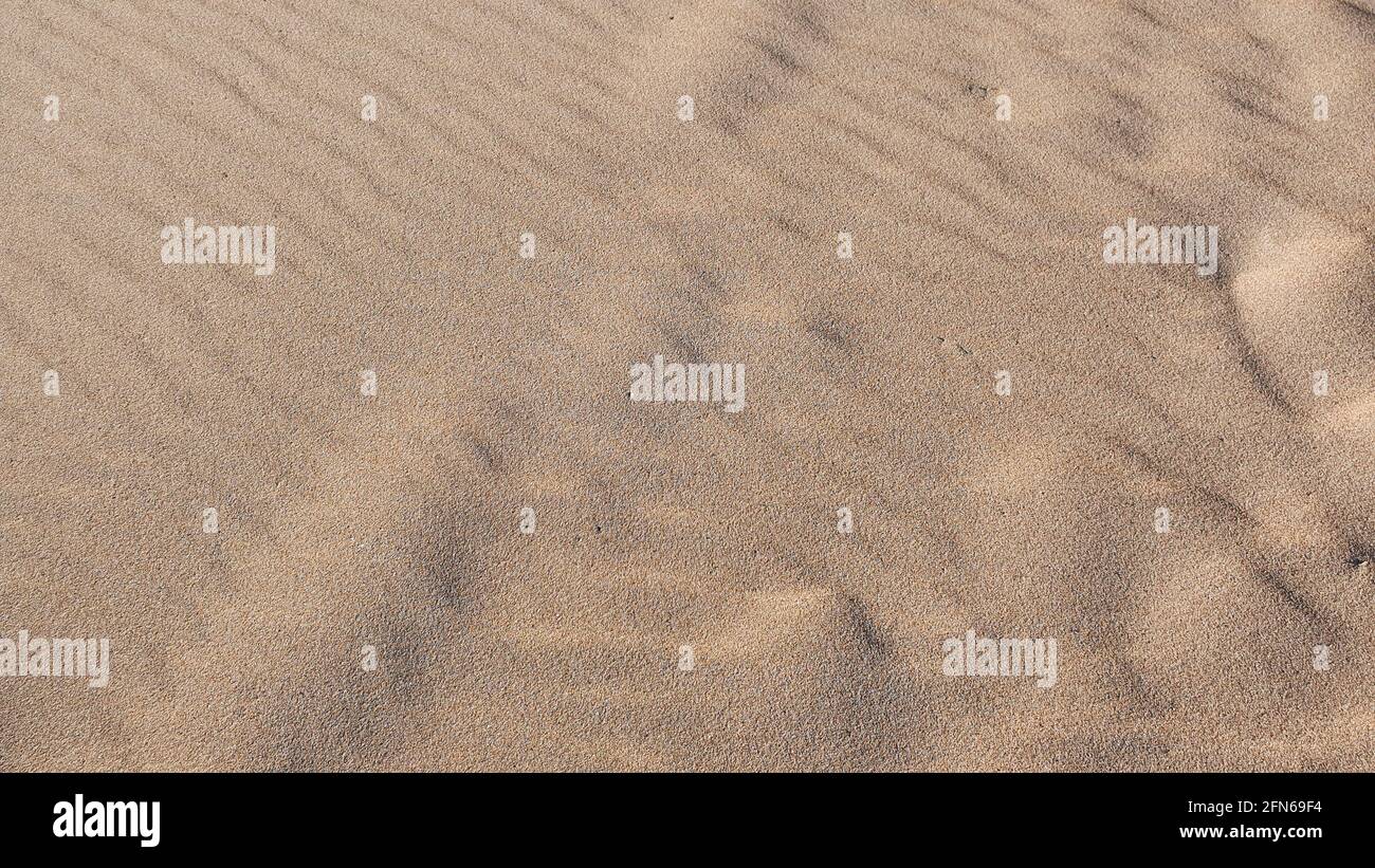 Patterns and textures in sand Stock Photo - Alamy