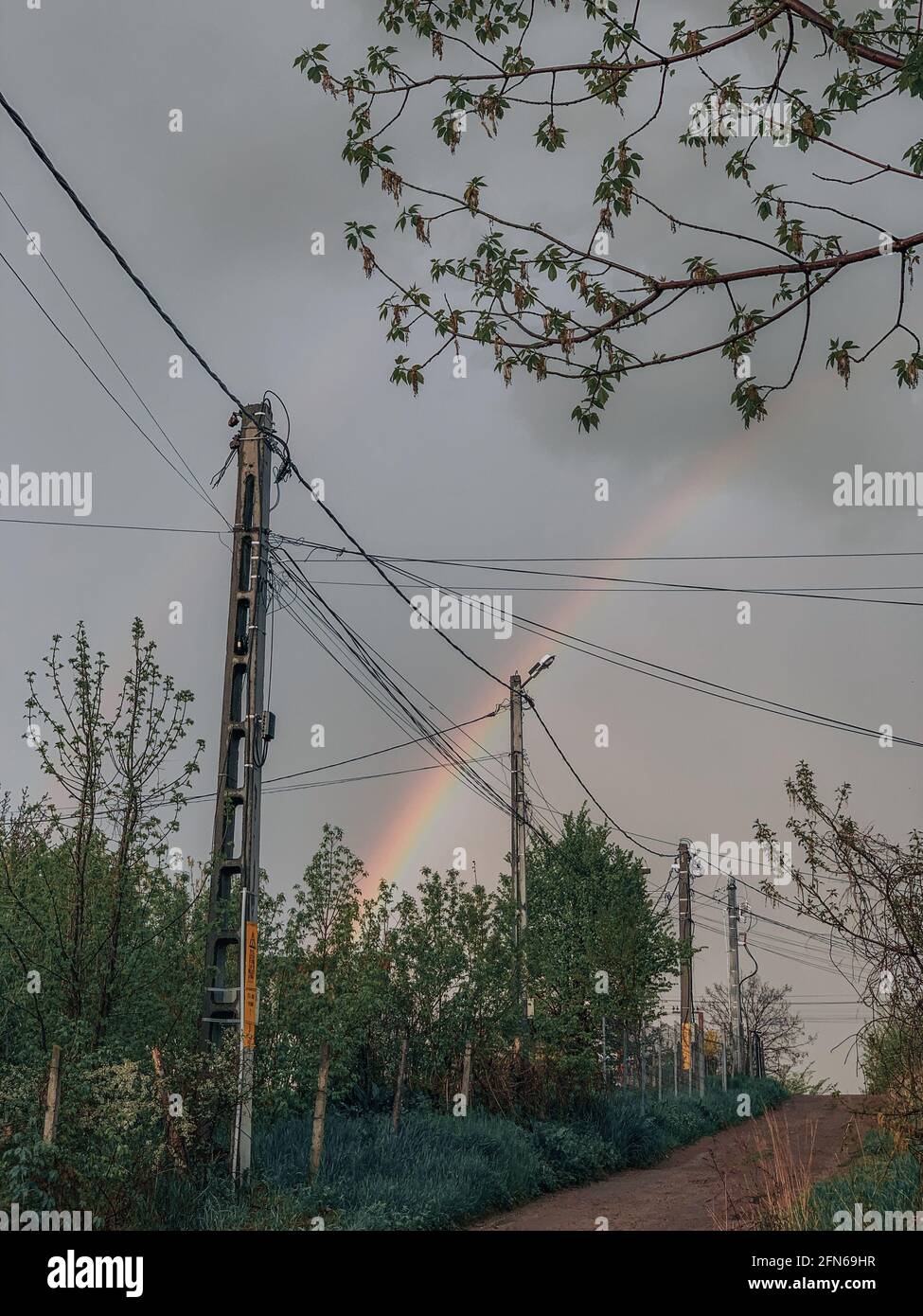 Beautiful view of the rainbow after raining Stock Photo - Alamy