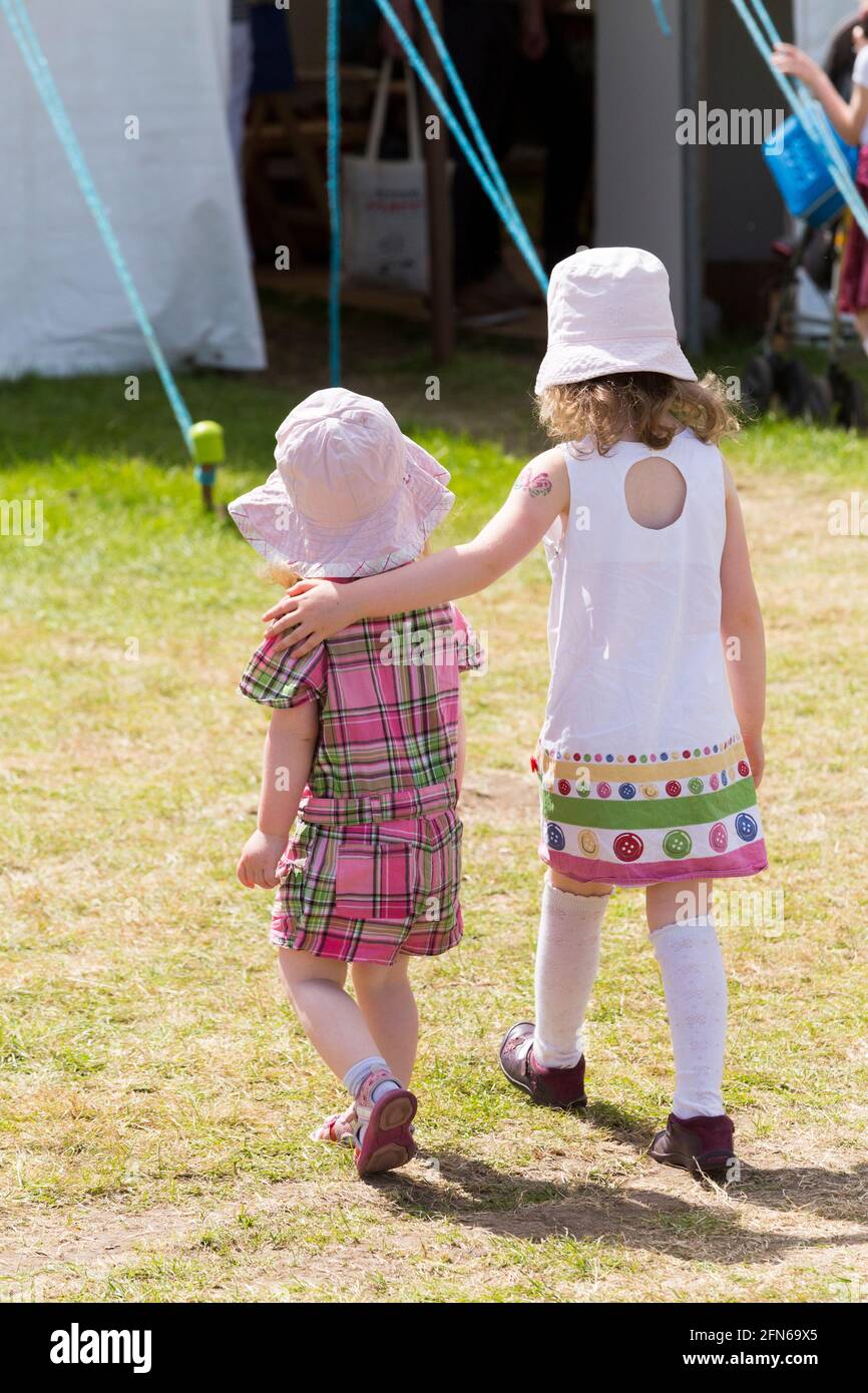 Girls arms around each other hi-res stock photography and images - Alamy