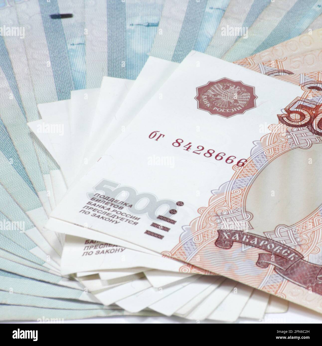 stack of many bond 5000, 1000 Stock Photo - Alamy
