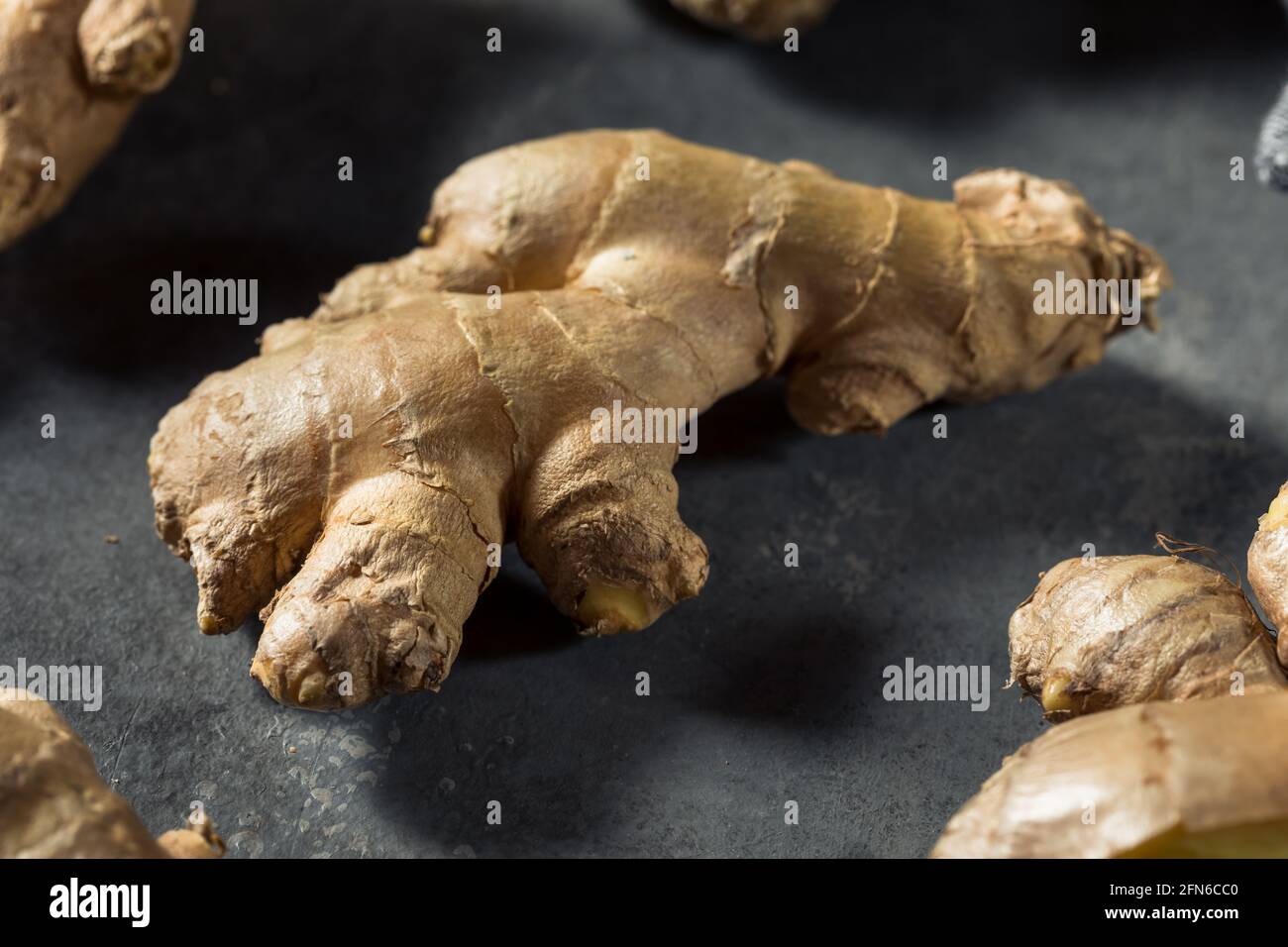 Fresh cut sliced root ginger spice herb food ingredient hi-res stock ...
