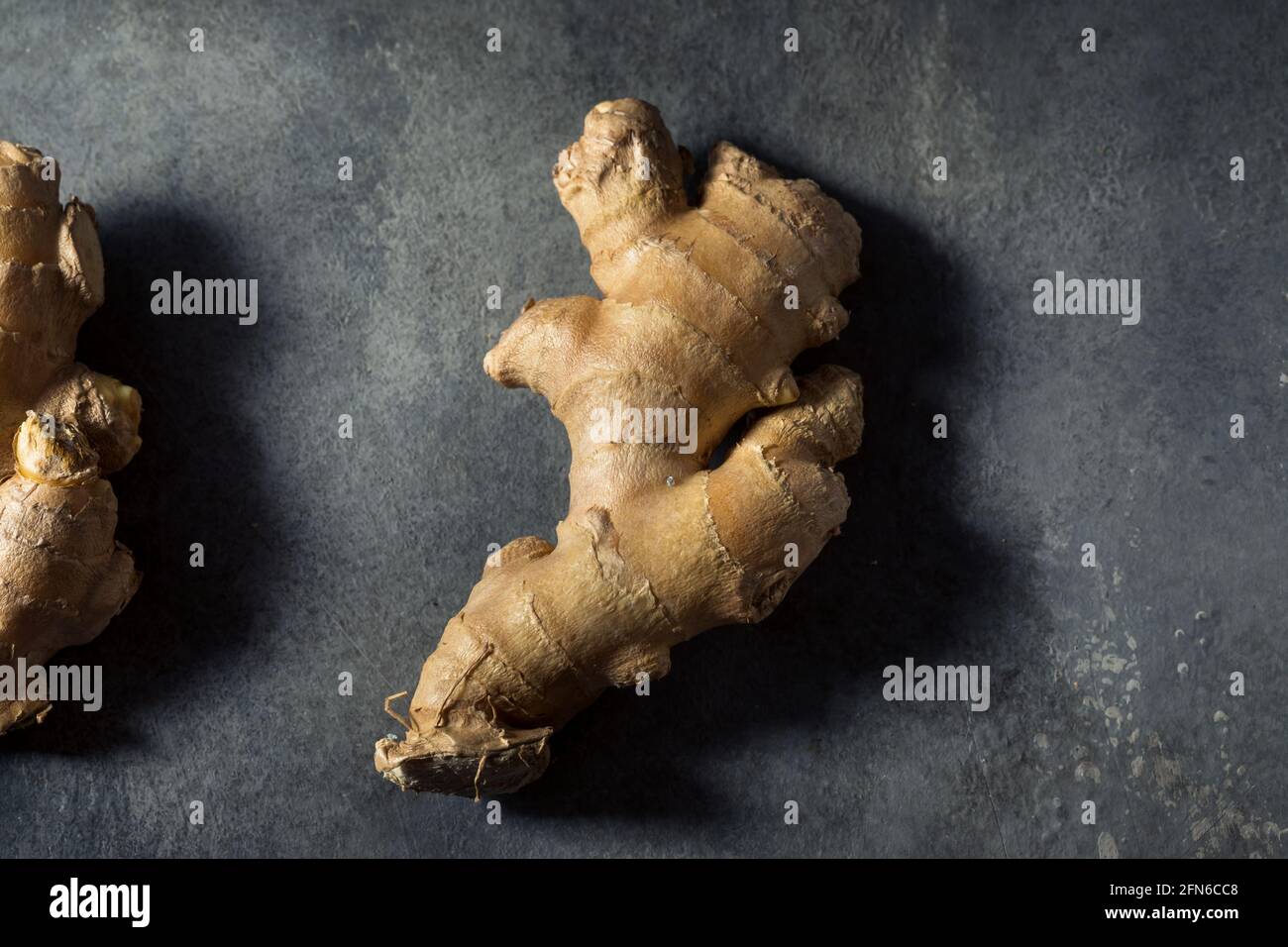 Fresh cut sliced root ginger spice herb food ingredient hi-res stock ...