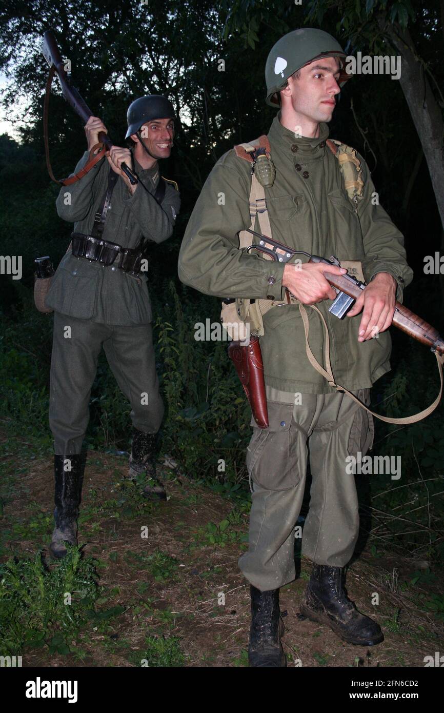 Funny German soldier wants to hit American with his rifle Stock Photo ...
