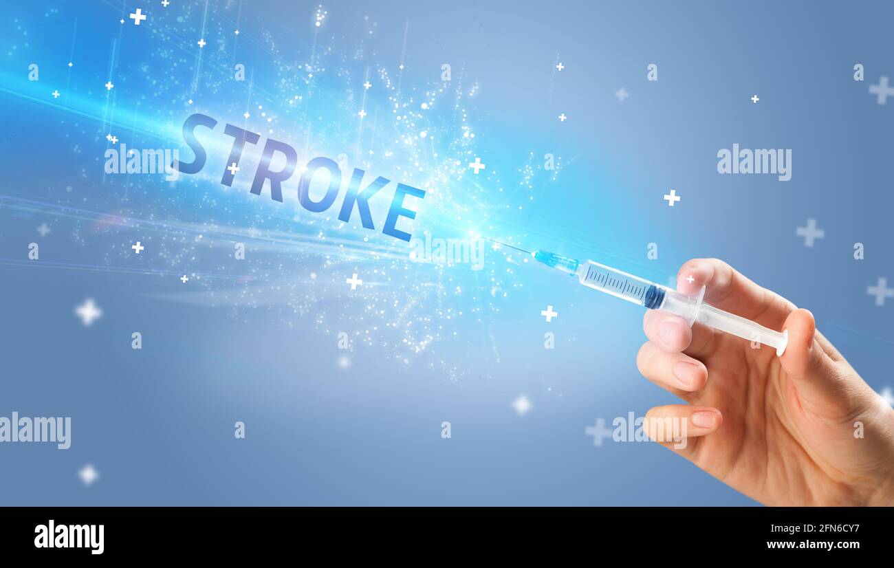 Syringe, medical injection in hand Stock Photo - Alamy