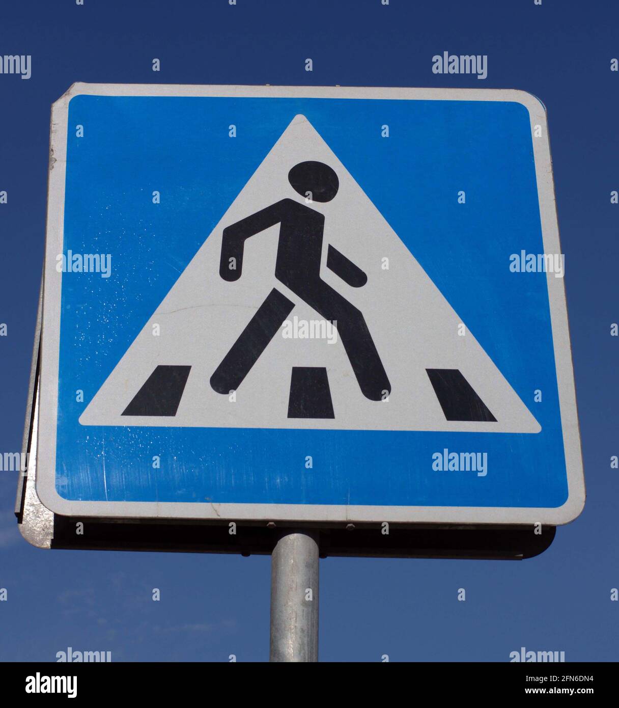 pedestrian crossing sign on street Stock Photo - Alamy