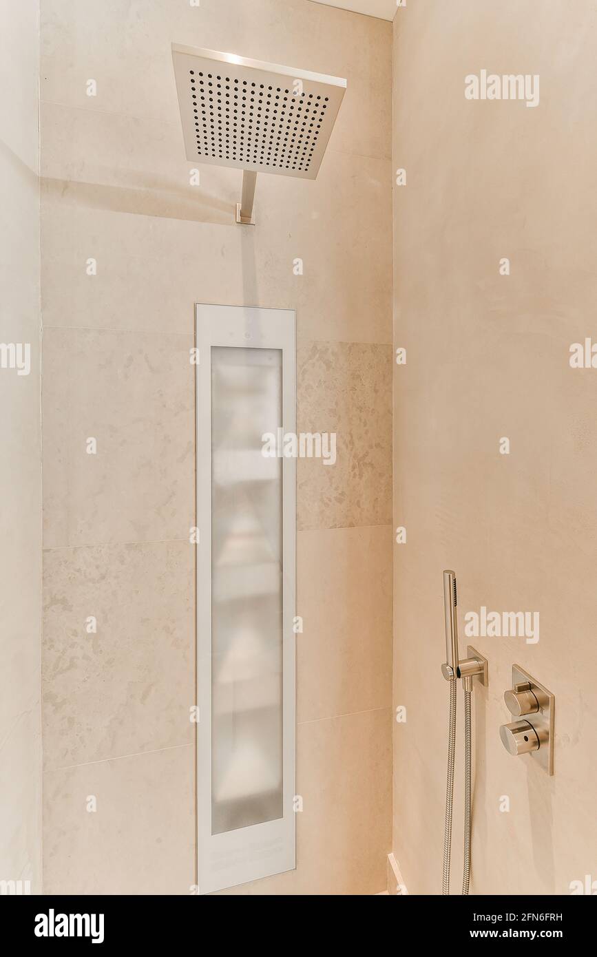 Modern rain shower set in bathroom Stock Photo - Alamy
