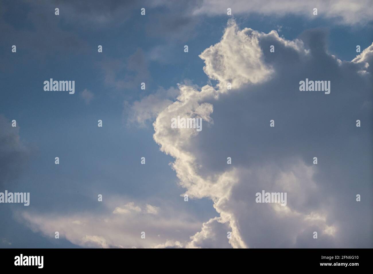 Slightly cloudy weather hi-res stock photography and images - Alamy