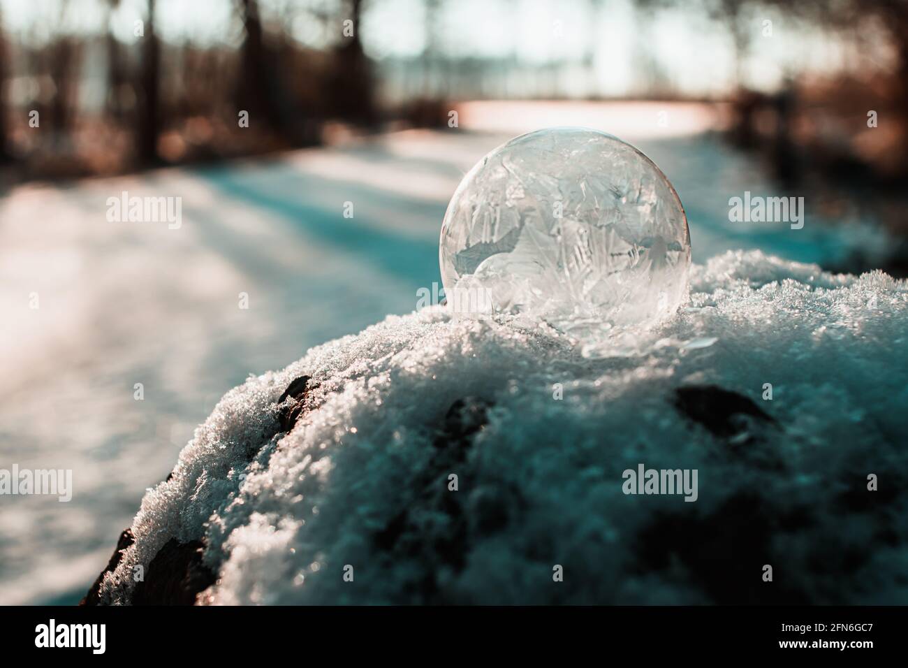 frozen soap bubble in winter Stock Photo - Alamy