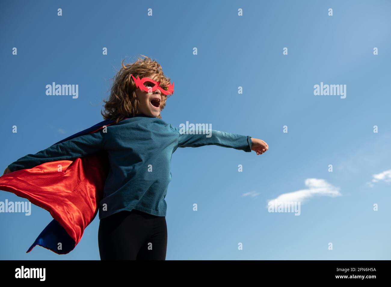 Excited child boy dressed like superhero. Super hero concept Stock ...