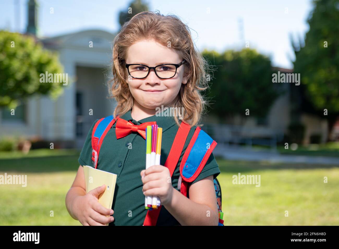 Funny nerd kid. School child concept. Cute pupil, kid in school uniform ...