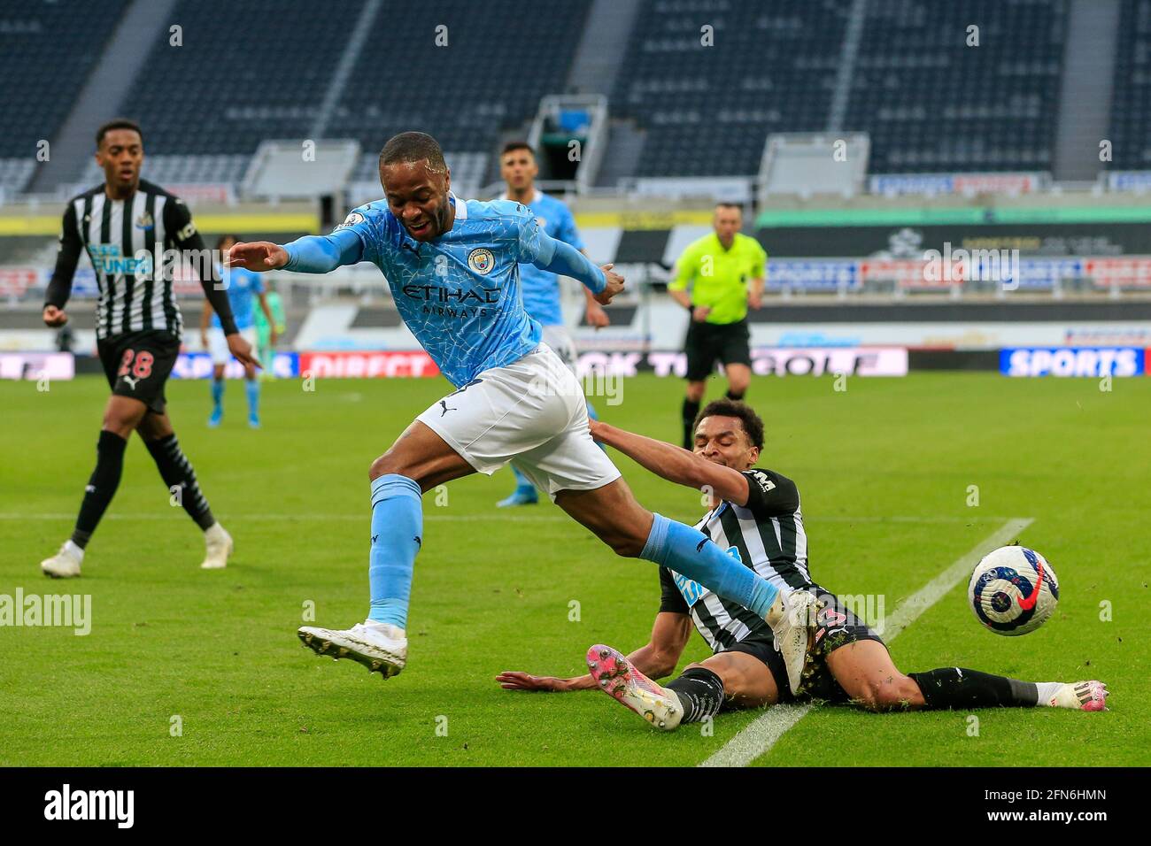 Jacob Murphy #23 of Newcastle United tackles Raheem Sterling #7 of ...