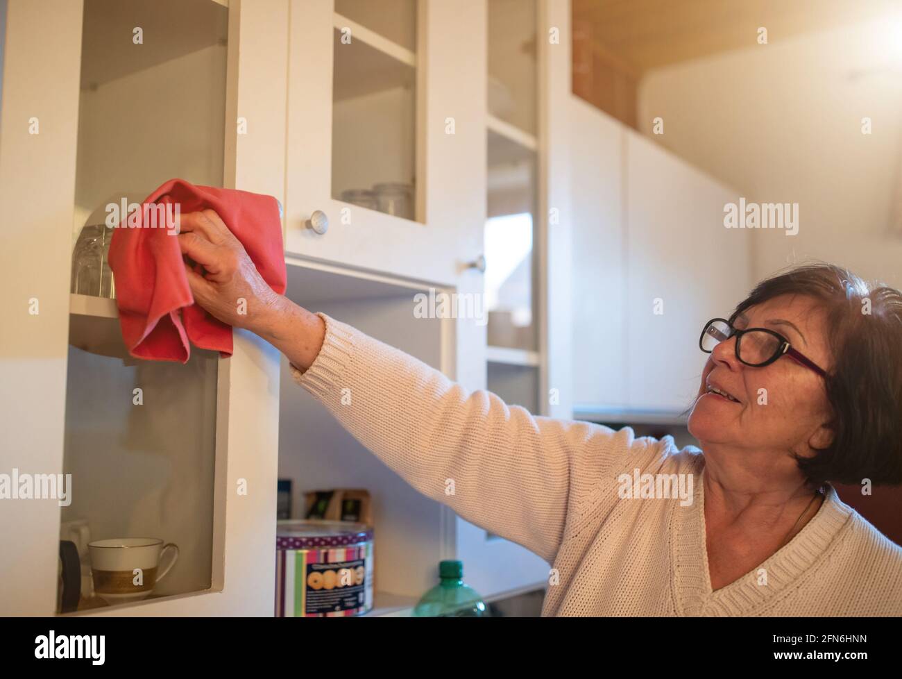 Wiping kitchen hi-res stock photography and images - Alamy
