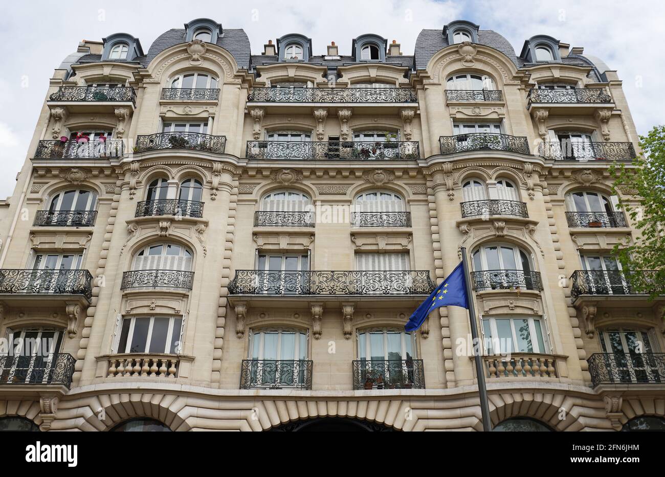 Traditional French house with typical balconies and windows. Paris ...