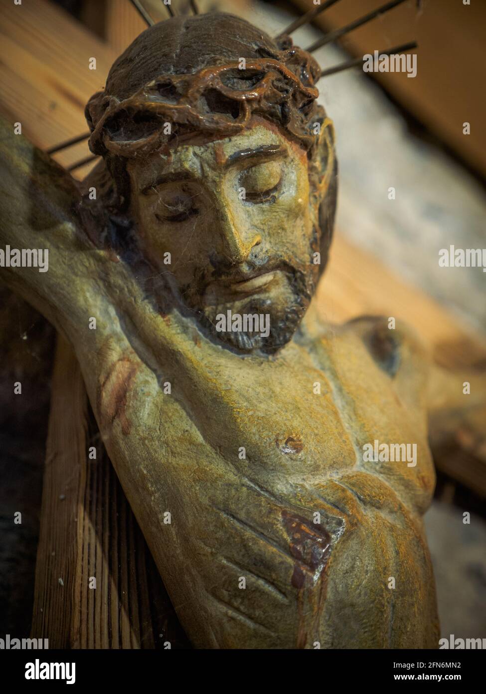 closeup of a Wooden Sculpture of Jesus Christ on the cross, Romanesque ...