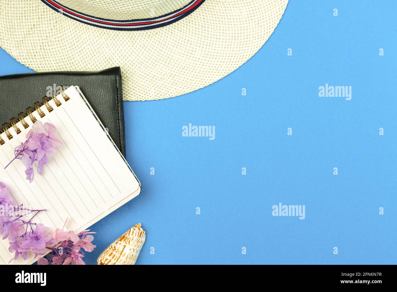 Summer vacation notebook, diary concept, tropical hat and sea shells on ...