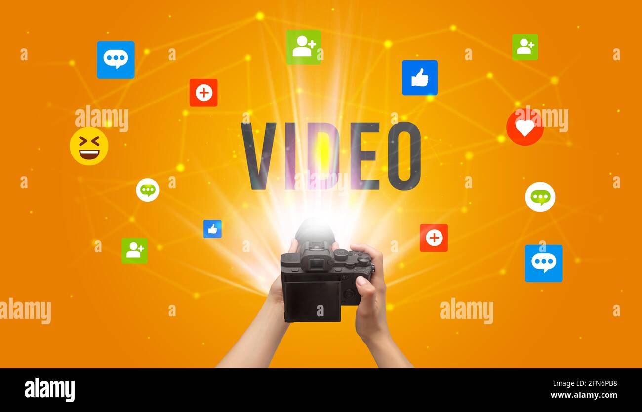 Using camera to capture social media content Stock Photo - Alamy